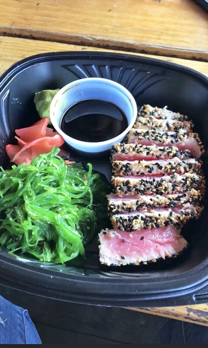 Sushi-grade sophistication! This sesame-crusted ahi tuna proves The Drunken Clam can do fancy just as well as fun.