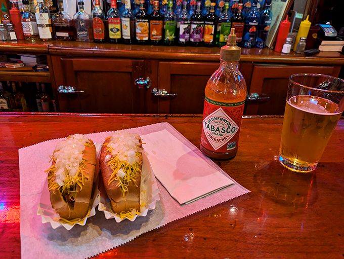 Some like it hot! These Coneys are getting cozy with Tabasco, proving that sometimes, three's company in the flavor department.