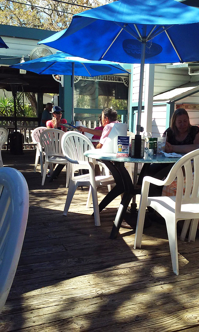 Where strangers become friends over fantastic food. This outdoor dining area is like a block party where everyone's invited, and the guest of honor is seafood.