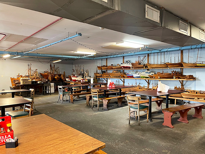 Ahoy, matey! This dining area feels like you've stepped aboard a whimsical fishing vessel. All hands on deck for dinner!