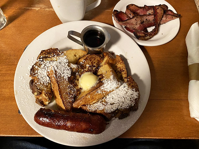 French toast that could make a Parisian weep with joy. Paired with that sausage? It's a breakfast mic drop.