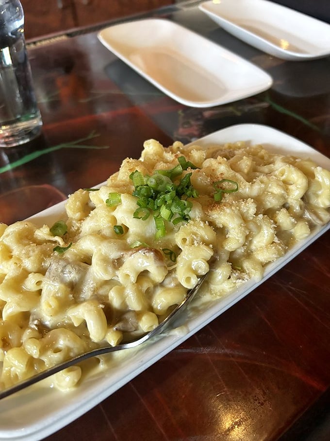 Mac & Cheese that's more indulgent than a power ballad. Creamy, dreamy, and topped with green onions for a pop of freshness.
