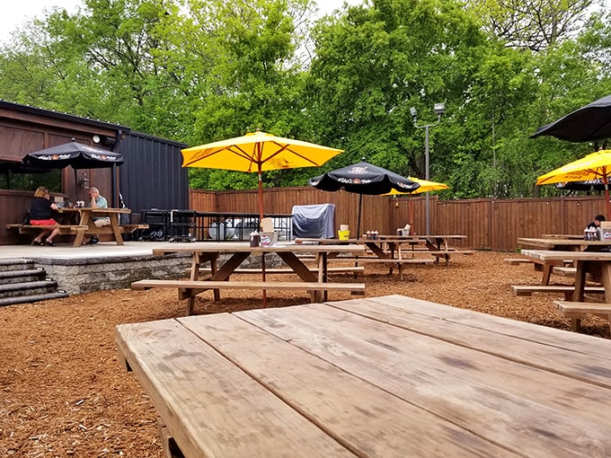 Outdoor seating that's pure Minnesota magic! Enjoy your BBQ feast under the trees &ndash; it's like a picnic, but with better food.