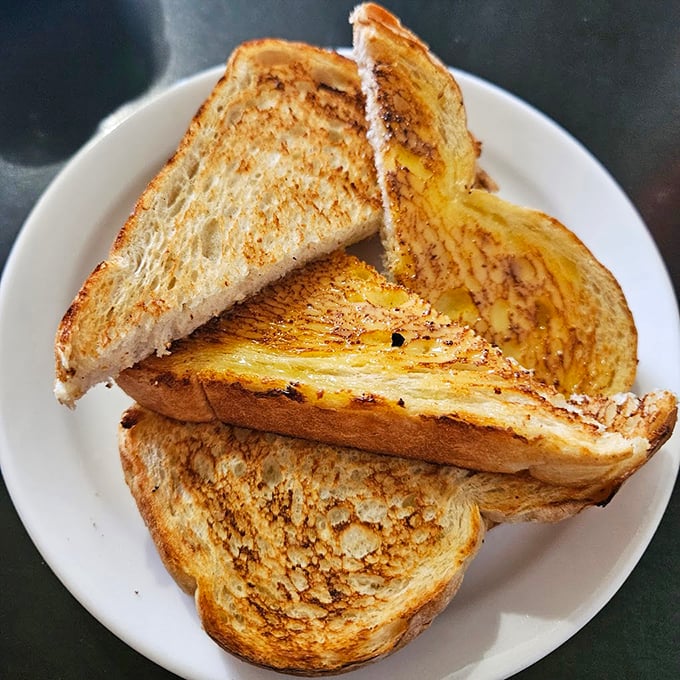 Golden, crispy, and ready for its close-up. This toast is the supporting actor that steals the show.