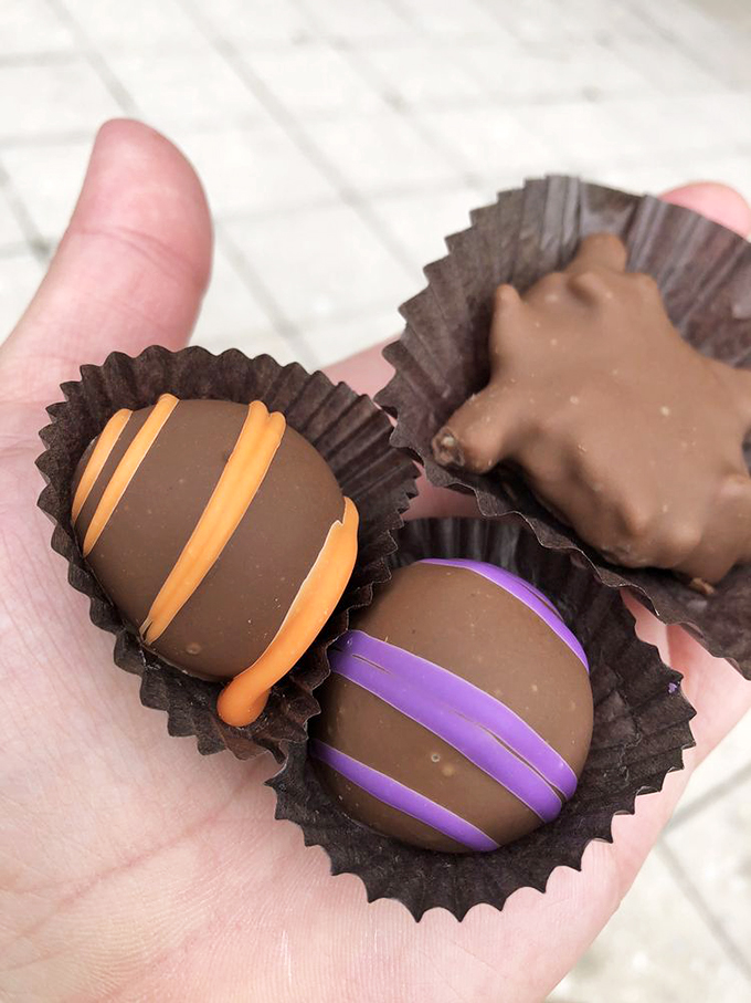 Truffles so pretty, they belong in a jewelry box. Each one a tiny masterpiece, almost too beautiful to eat. Almost.