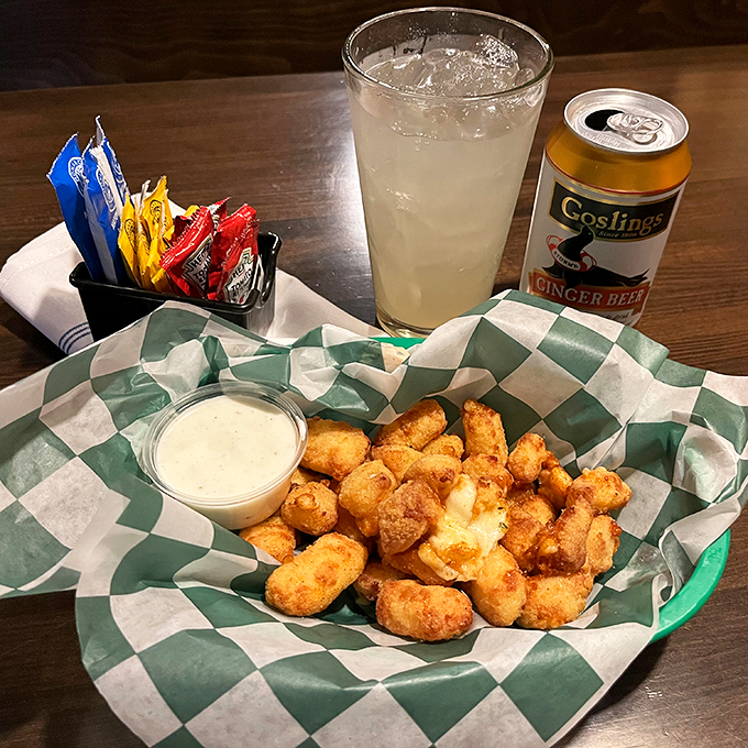 Golden nuggets of joy! These cheese curds are the Turf Club's edible high notes &ndash; crispy, gooey, and guaranteed to make your taste buds sing.