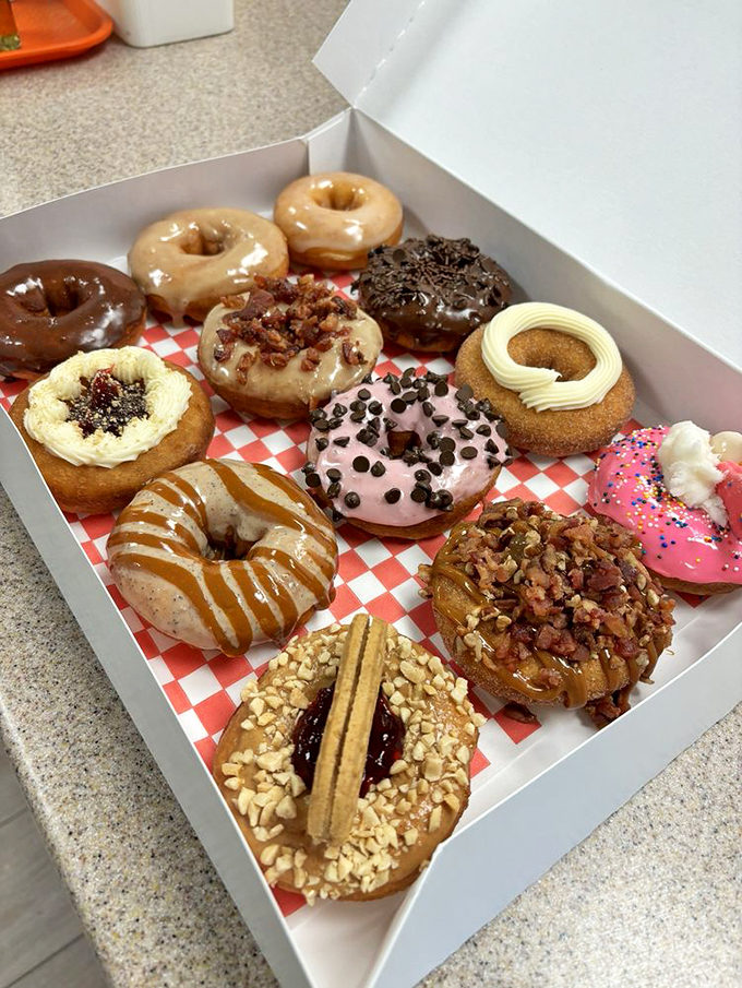 A box of pure happiness. This dozen isn't just breakfast, it's a choose-your-own-adventure in donut form.