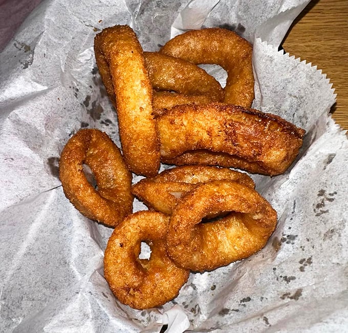 Onion rings so perfectly golden, they belong in Fort Knox. Crispy, savory, and addictive &ndash; resistance is futile!