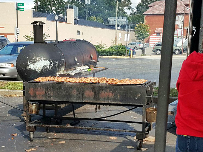 Behold, the altar of smoke and fire! This isn't just cooking; it's a time-honored ritual that turns mere meat into miracles.