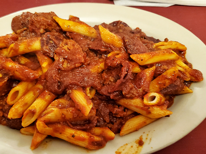 Pasta la vista, baby! This hearty plate of penne is dressed to impress and ready to transport you to flavor town.