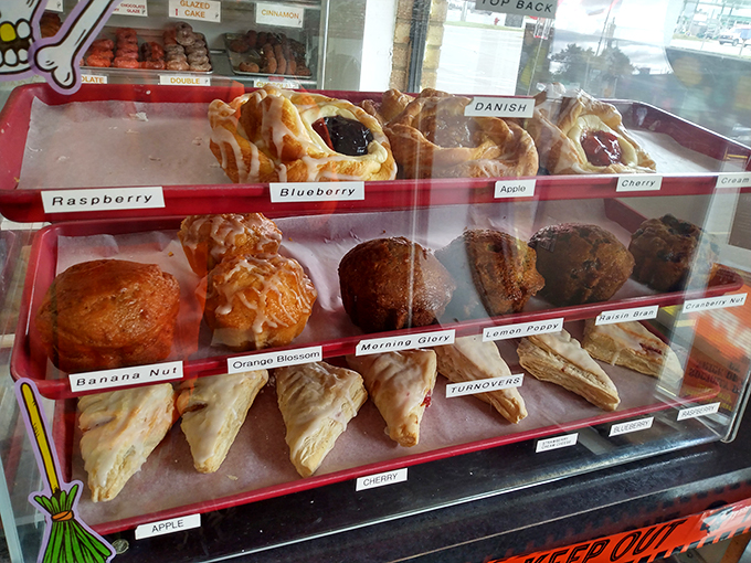 Pastry perfection! From Danish to turnovers, this display case is a United Nations of baked goods, fostering peace through pastry.