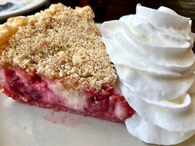 This isn't just pie, it's a slice of heaven. With a cloud of whipped cream so light, it might just float away if you don't eat it fast!