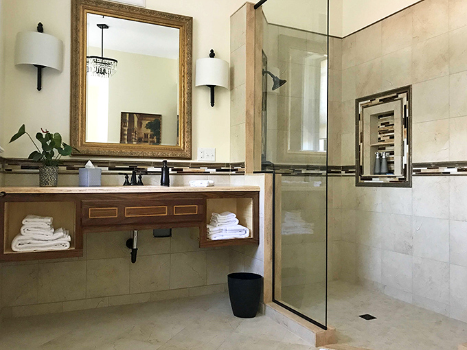 Even Cinderella needs a place to freshen up. This sleek bathroom proves you can have modern amenities without sacrificing classic style.