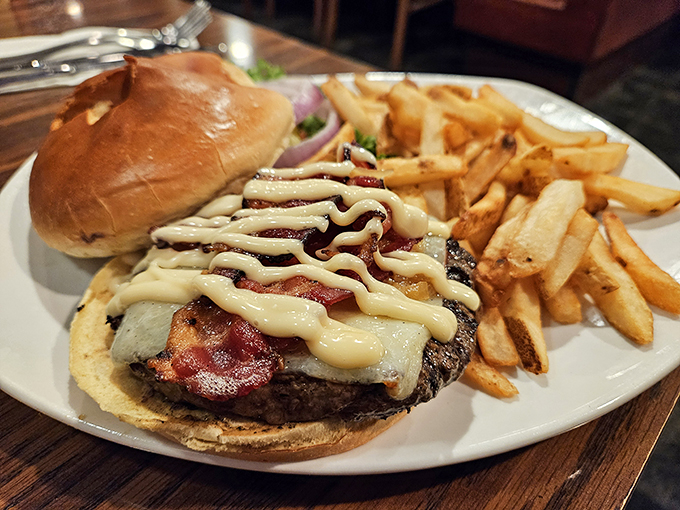 This isn't just a burger; it's a tower of power. Prepare for a flavor explosion that'll rock your world.