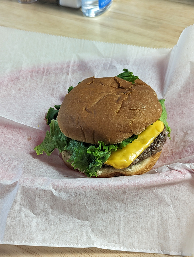 Ladies and gentlemen, meet the star of the show! This burger is dressed to impress and ready to steal your heart.