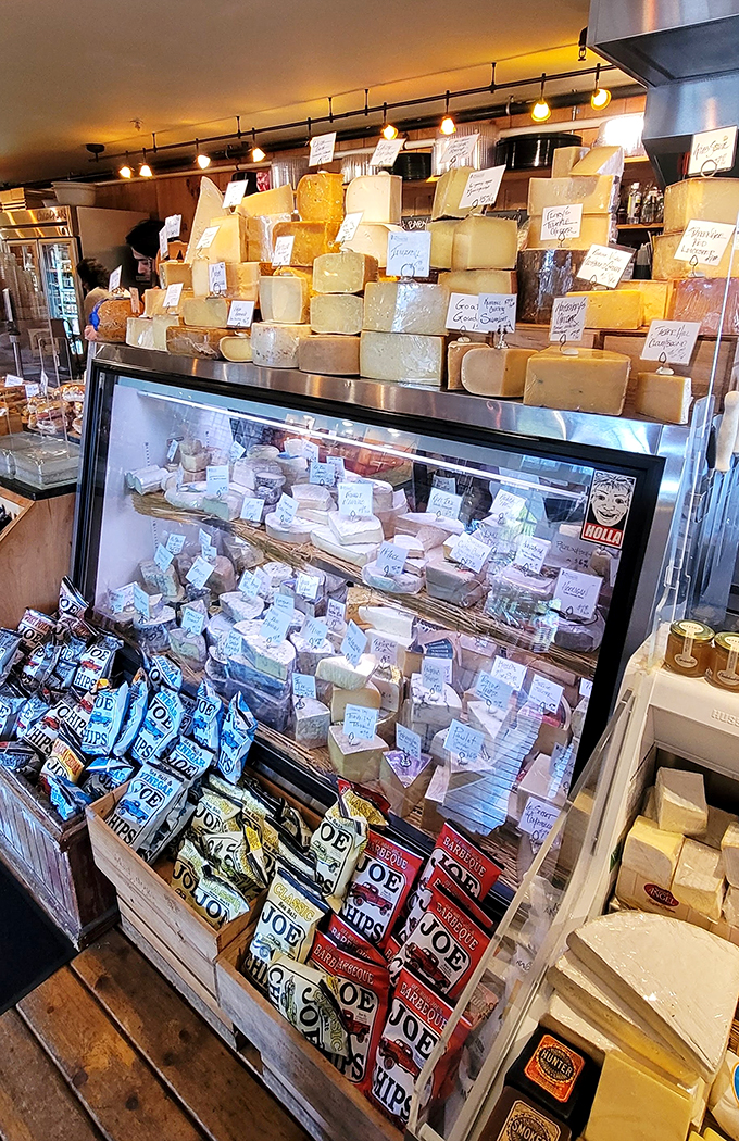 Behold the Great Wall of Cheese! This display is proof that dreams do come true, especially cheesy ones.