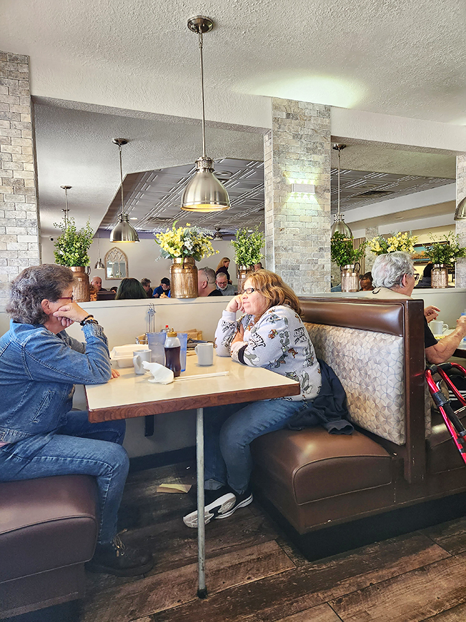 Cozy booths, friendly chatter, and the promise of good eats – this is where food meets fellowship, folks!