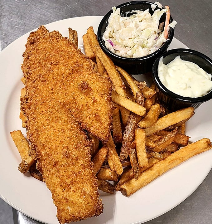 Fish so crispy, it could audition for a potato chip commercial. Paired with those golden fries, it's a match made in comfort food heaven.