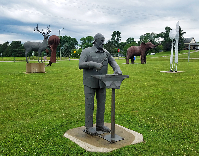 Meet the man behind the metal! This life-sized sculpture pays homage to the artist who turned Vining into a wonderland of whimsy.