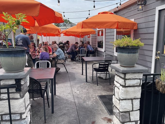 Outdoor seating that's more inviting than a hammock on a lazy Sunday. Grab a table, soak up some rays, and let the good times roll!