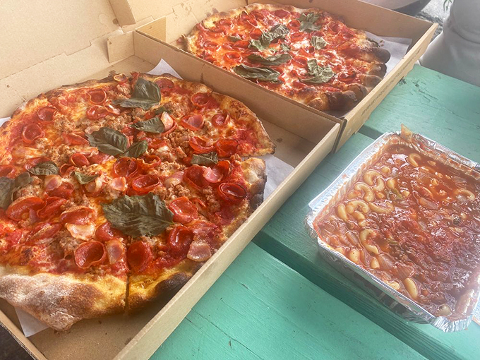 The ultimate trifecta! Pizza, goulash, and what appears to be cheesy bread &ndash; it's like the Avengers of comfort food, assembled to save your hunger.