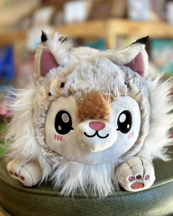 Cuddle up with a good book... and a cute critter! This adorable plush friend is ready to join you on your next literary adventure.