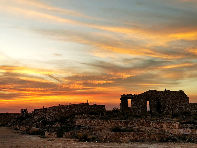 Arizona sunsets paint the ruins in golden light, transforming these ghostly remains into something almost magical.
