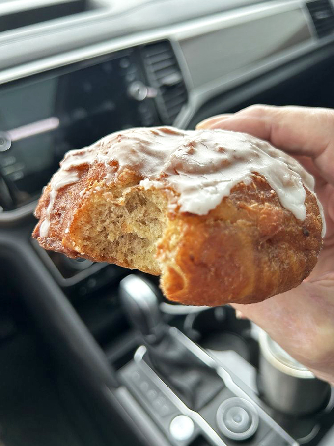 The Incredible Hulk of pastries! This apple fritter looks like it's been working out at the gym, bulging with apple-cinnamon goodness and flexing its glazed muscles.