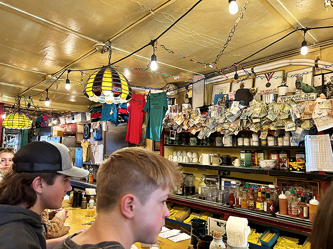 Breakfast bliss in action! These happy diners are living proof that good food and cozy quarters are the secret ingredients to morning magic.