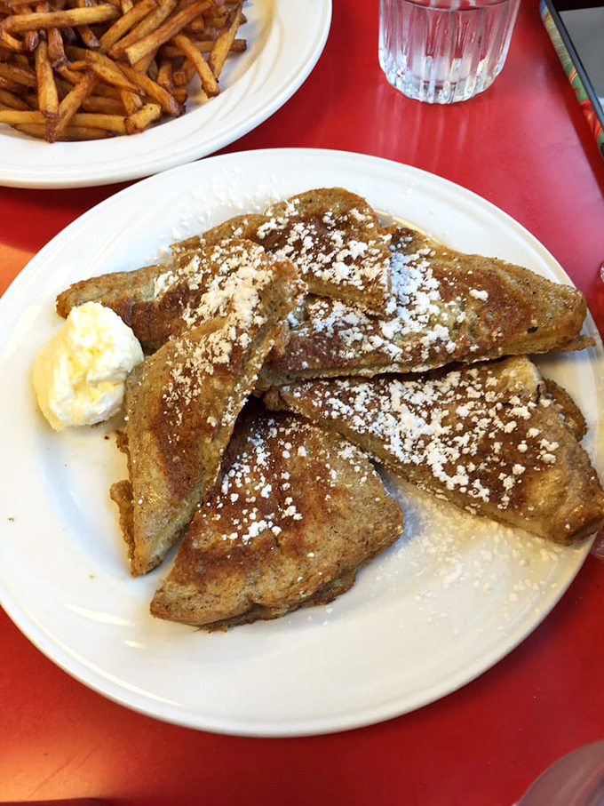 French toast that puts France to shame! It's a carb-lover's dream, dusted with powdered sugar snow.
