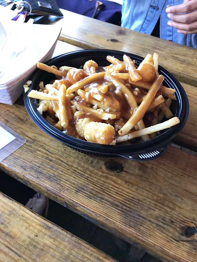 Comfort food alert! These gravy-smothered fries and tots are like a warm hug for your taste buds.