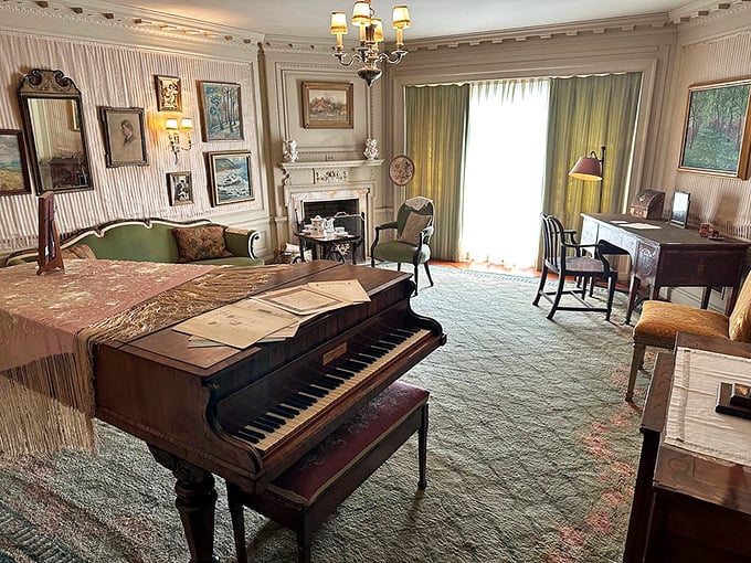 "Tickle the ivories like a Gilded Age Gershwin!" This grand piano, nestled in a room of refined elegance, awaits the next ragtime rendition or classical concerto.
