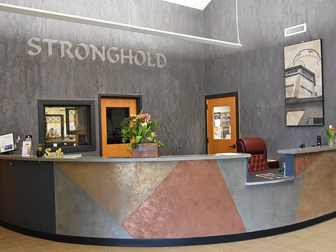Welcome to Stronghold, where every visit is legendary. This modern reception area proves even castles need a touch of 21st-century hospitality.