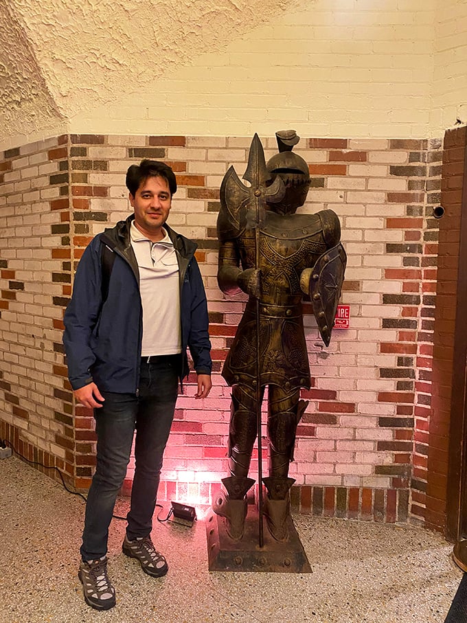 Who's guarding whom? This dapper visitor seems to have made a new friend. Let's hope he doesn't have to report for duty!