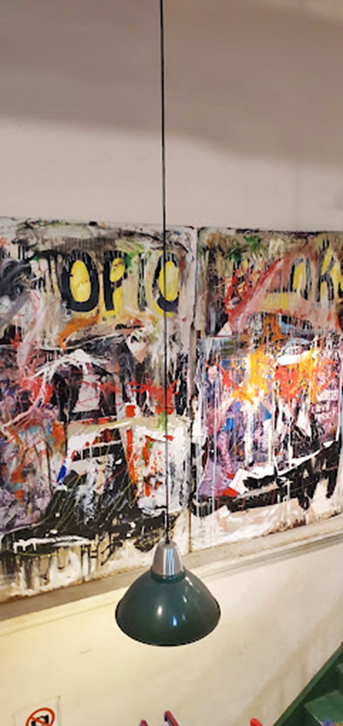 Art that speaks volumes! Myopic's eclectic decor adds a splash of color to your literary journey, inspiring creativity at every turn.