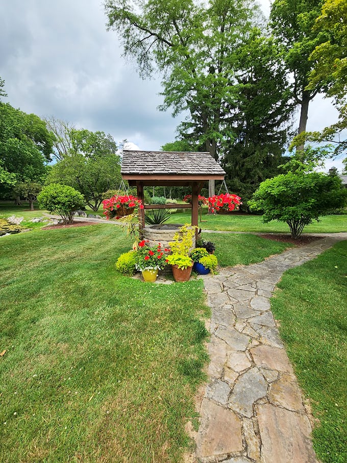 Wishing well or fairy tale portal? This quaint structure adds a touch of whimsy to the lush surroundings.