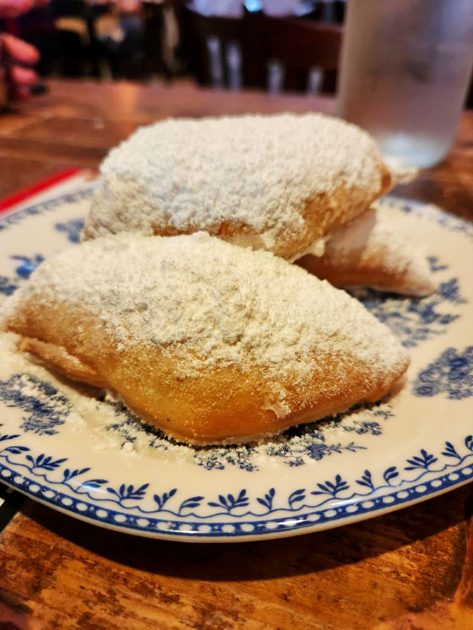 Powdered sugar paradise! These beignets are so light and fluffy, they might float away if not for their sweet, sugary coating.