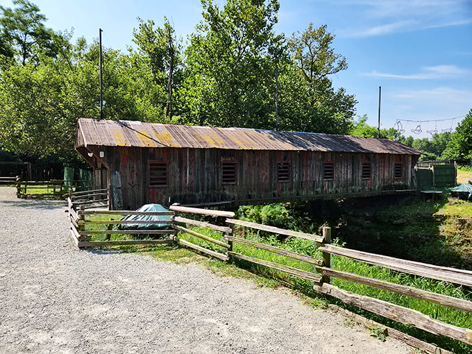 Bridge over untroubled water. A covered walkway that's equal parts romantic and practical. Because rain shouldn't ruin a good view.