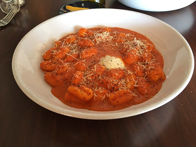 Gnocchi that would make your nonna weep with joy. These pillowy potato perfections are swimming in a sea of savory bliss.