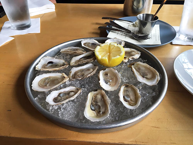 Oysters on ice, looking oh-so-nice! These briny beauties are fresher than a sea breeze and smoother than a jazz saxophone solo.