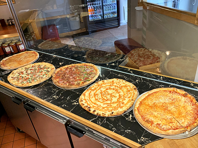 "A slice of heaven for every palate." Mimmo's pizza selection is like a United Nations of toppings, bringing world peace one delicious pie at a time.