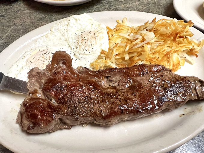 Steak for breakfast? Don't mind if I do! This perfectly seared beauty, paired with eggs and hash browns, is the ultimate morning indulgence.