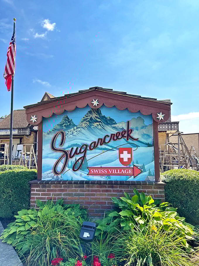 "The hills are alive... with the sound of ticking!" Sugarcreek's Swiss Village sign promises alpine adventures in the heart of Ohio.