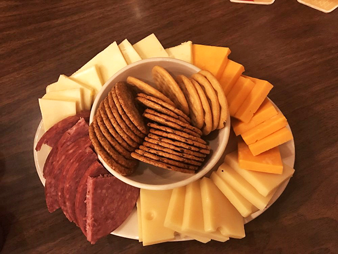 A cheese plate that would make a mouse weep with joy. It's not just a snack, it's an edible work of art.