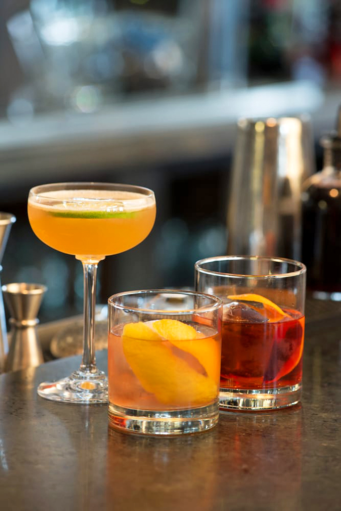 Cocktail o'clock has never looked so good! These drinks are dressed to impress, with garnishes so fresh they might just photobomb your Instagram story.