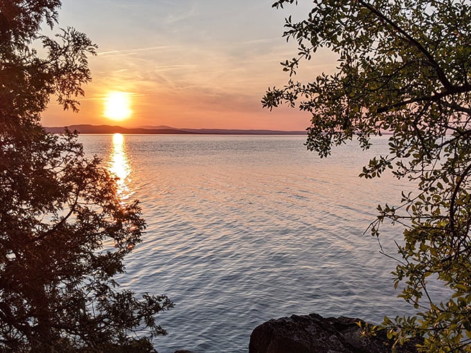 Sunset goals! Lake Champlain's putting on a light show that'd make Broadway jealous.