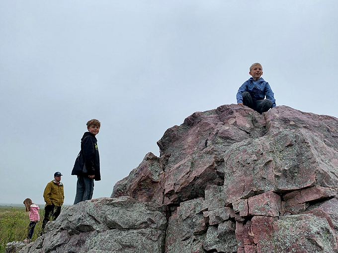 King of the hill, Blue Mounds edition! These adventurers are living out their "Lion King" fantasies, minus the talking animals.
