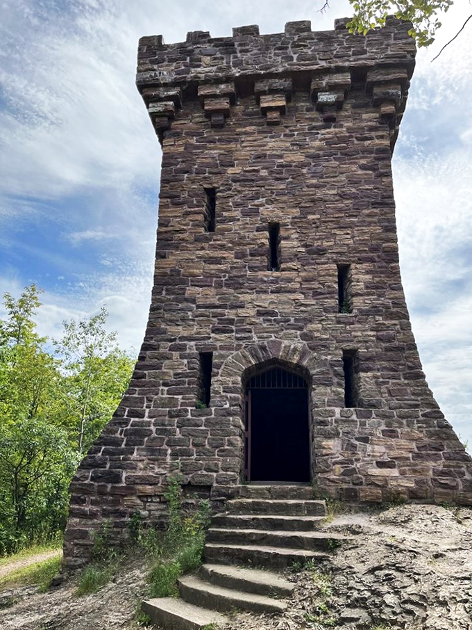 Stone-cold stunning: Ethan Allen Tower stands proud against the sky, a testament to Vermont's rugged beauty and revolutionary spirit.