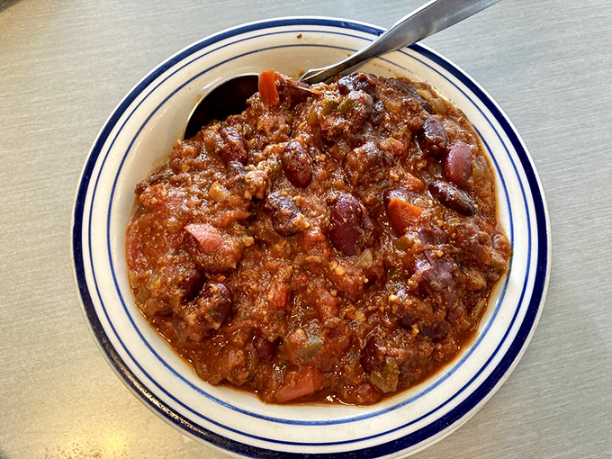 Vegetarian chili that meat-lovers can't resist! This hearty bowl proves that plant-based can be just as satisfying as its beefy counterpart.