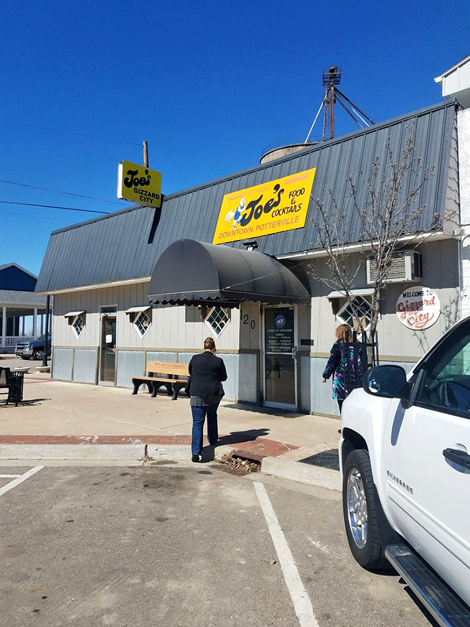 The pilgrimage begins here! Joe's Gizzard City stands ready to welcome hungry travelers into its deep-fried embrace. Loosen those belts, folks!